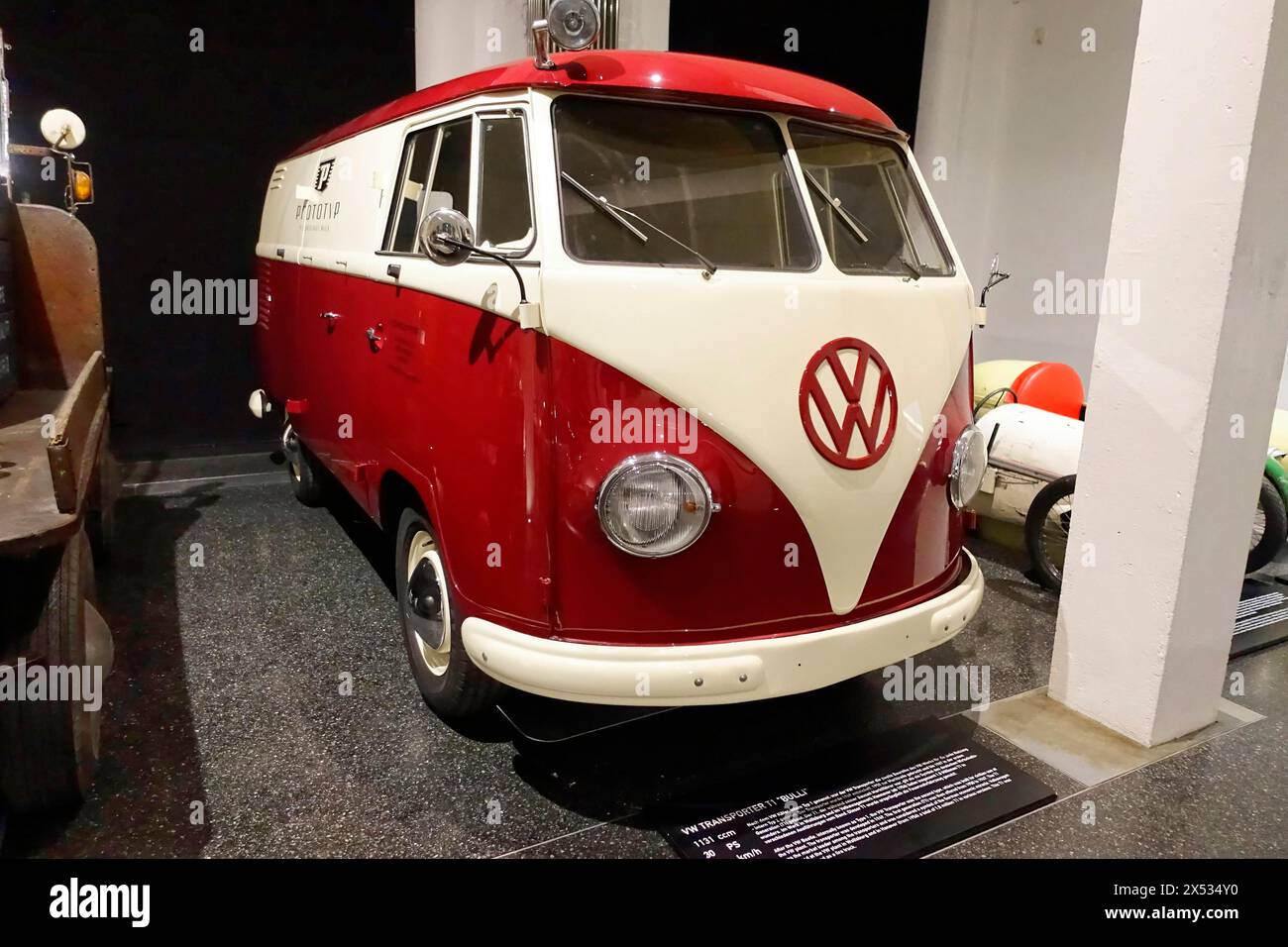 A red and white Volkswagen T1 bus on display in the museum, AUTOMUSEUM ...