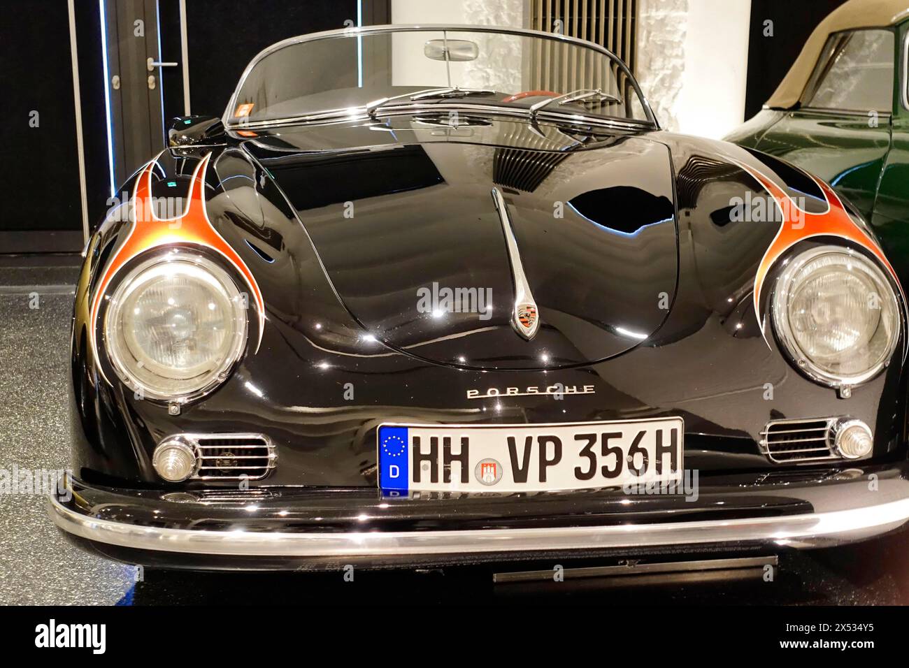 PORSCHE 356 A SPEEDSTER, A black Porsche presented with an eye-catching ...
