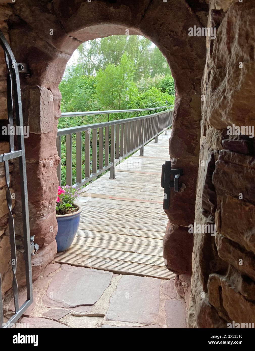 View of narrow castle gate access from medieval Trendelburg castle from ...