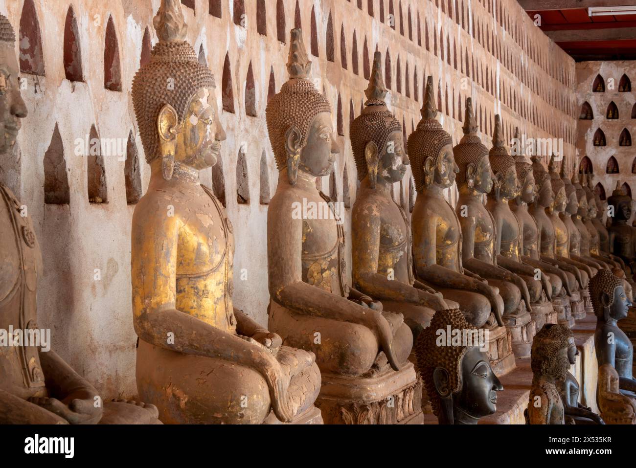Ancient Buddha Statues In The Courtyard Of Wat Si Saket Vientiane