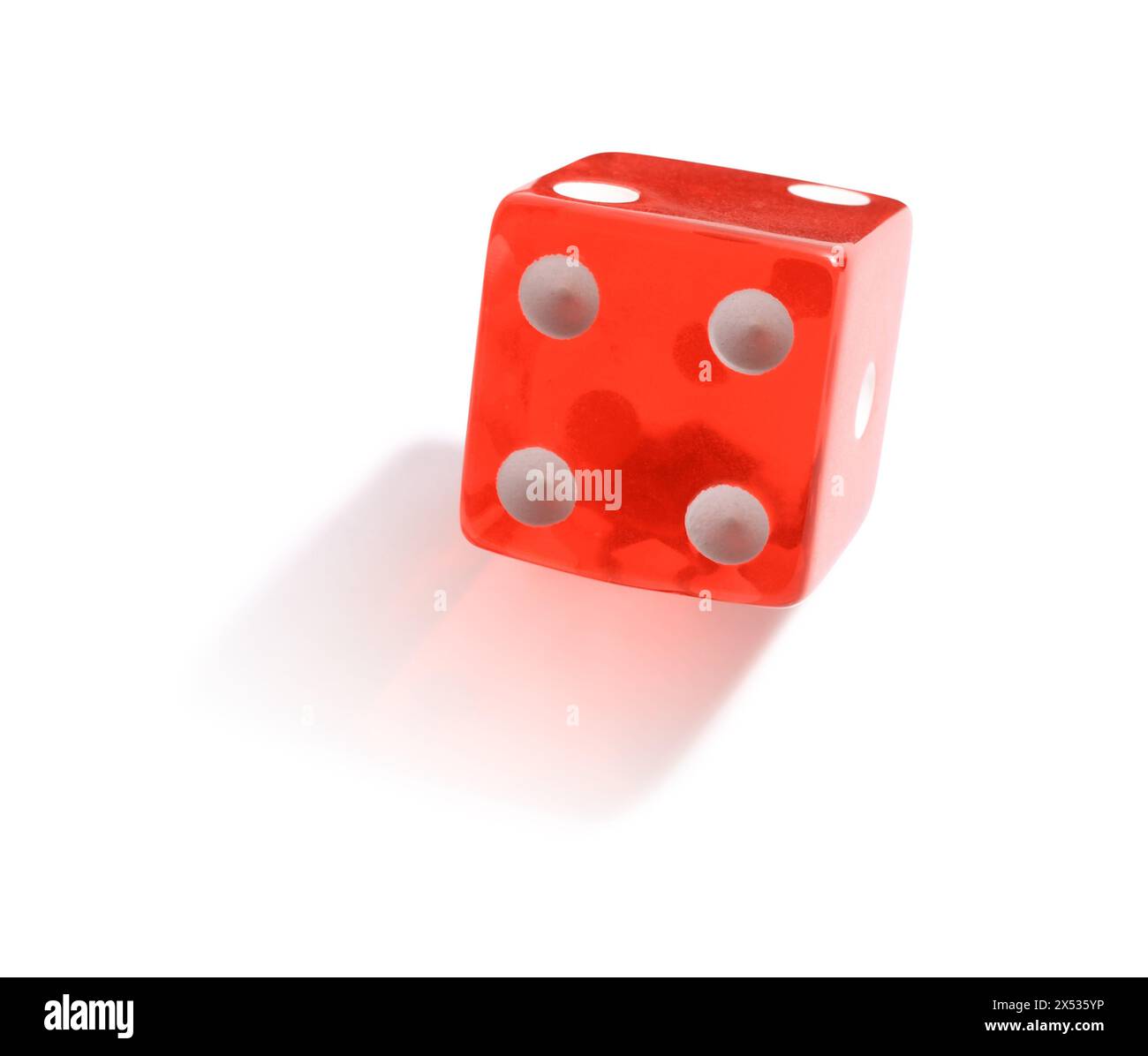 One red game dice isolated on white Stock Photo - Alamy