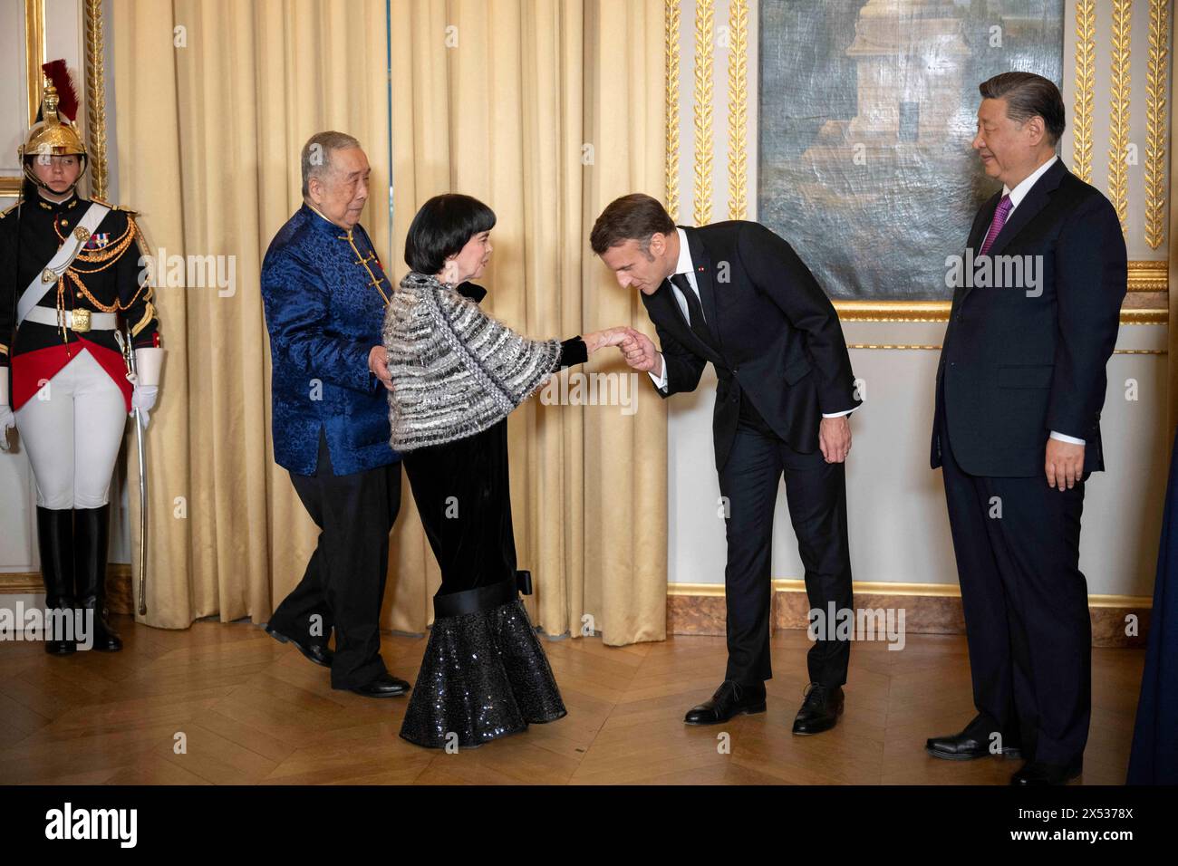 French singer Mireille Mathieu shakes hands with Chinese President Xi ...