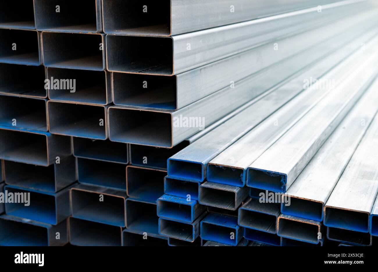 Industrial warehouse stock of rectangular metal pipes for building and ...
