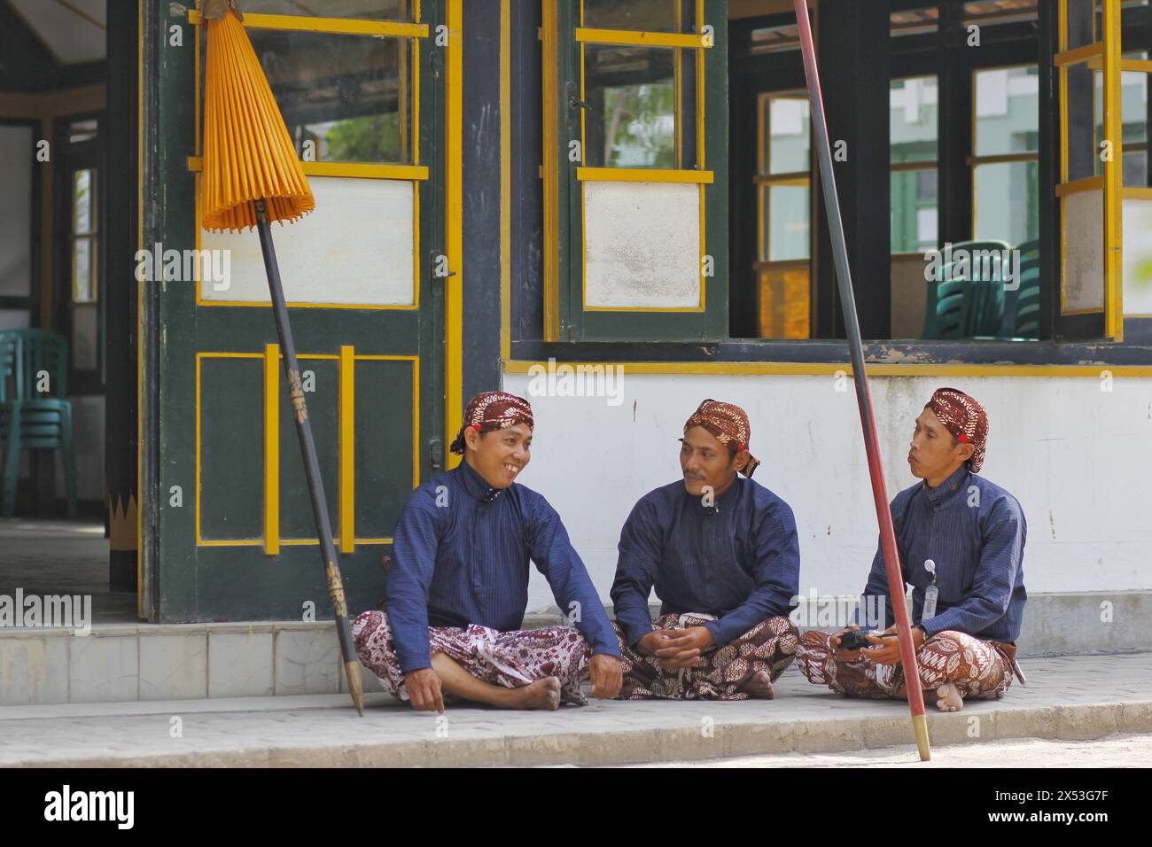 Abdi Dalem Yogyakarta palace chat warmly while on duty guarding one ...