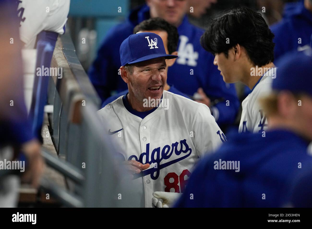 Los Angeles Dodgers first base coach Clayton McCullough (86) talks with ...
