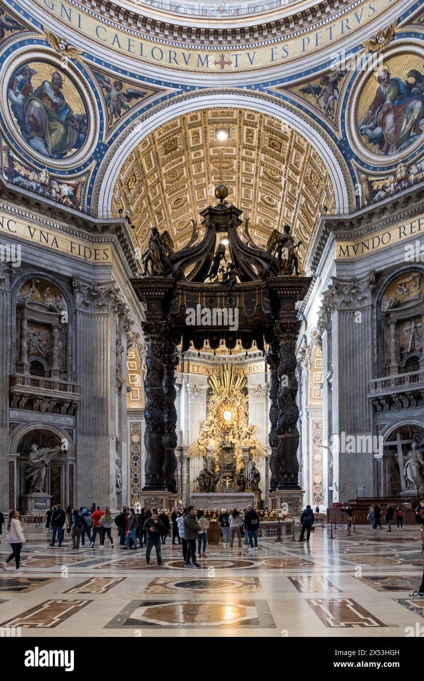 Detail of St. Peter's Baldachin, a large Baroque sculpted bronze canopy over the high altar of ...