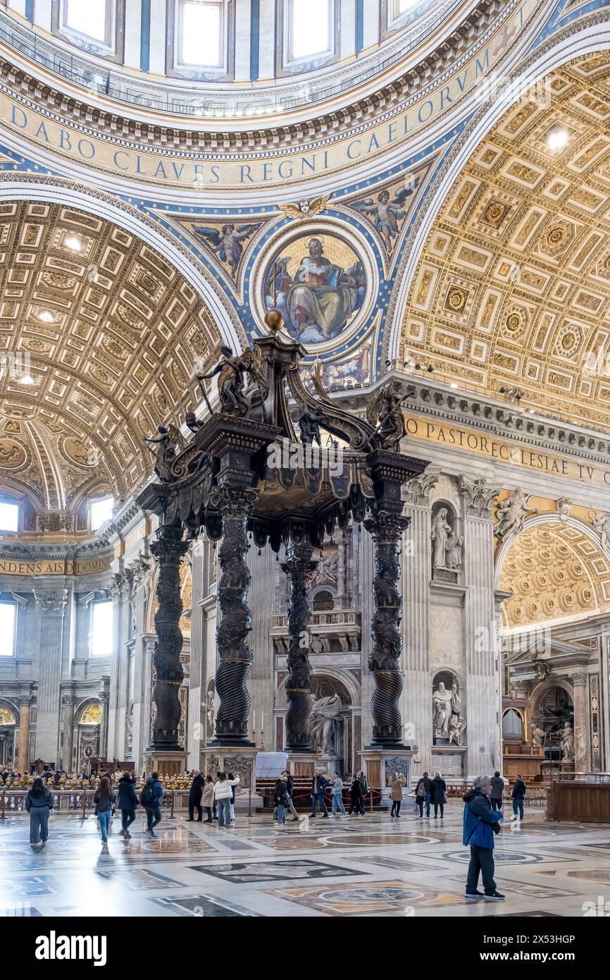 Detail of St. Peter's Baldachin, a large Baroque sculpted bronze canopy over the high altar of ...