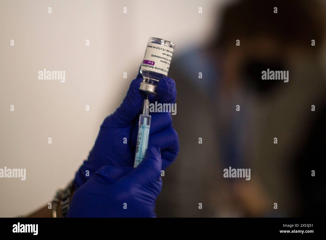 Madrid, Spain. 9th Apr, 2021. A nurse prepares to administer a dose of ...