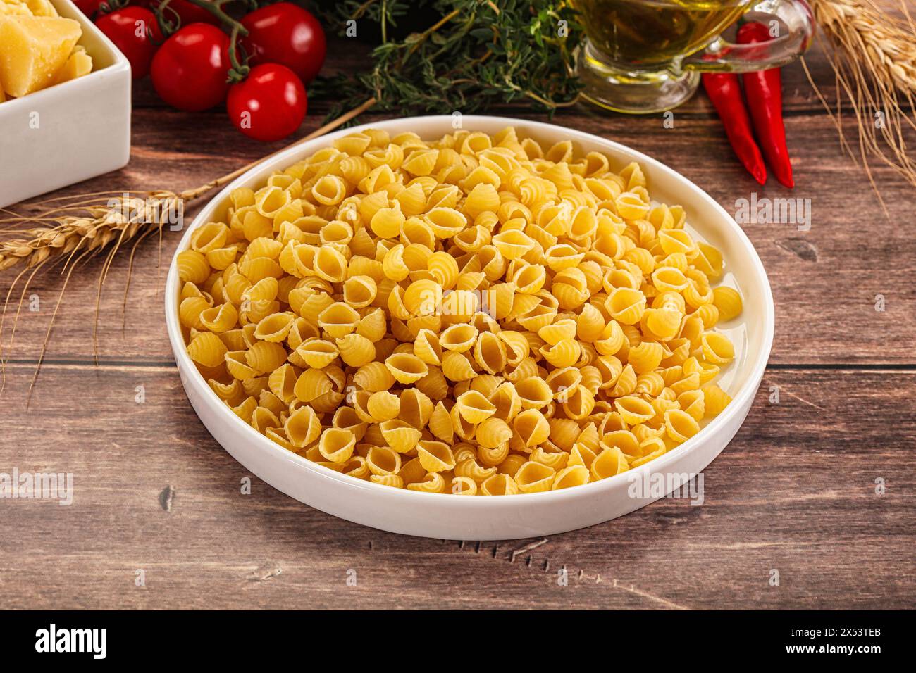 Italian cuisine - dry conchiglie shell pasta Stock Photo - Alamy