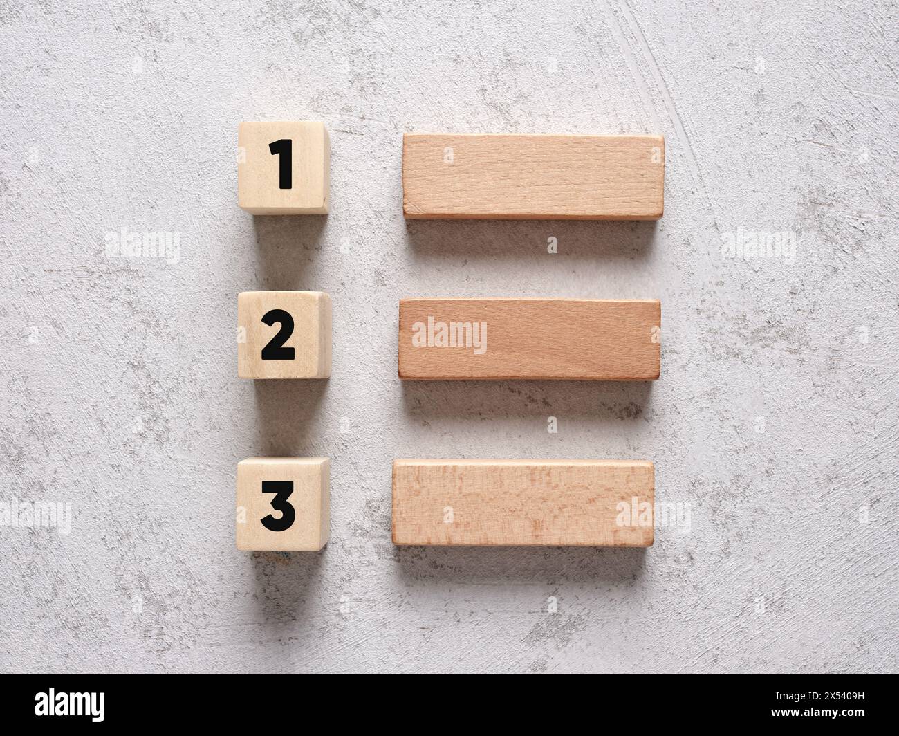 To do list with numbers and wooden blocks over white textured ...