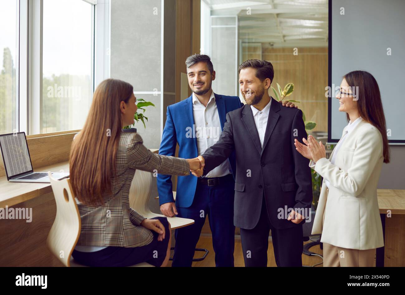 Business people shaking a hand as formal greeting, congratulation ...