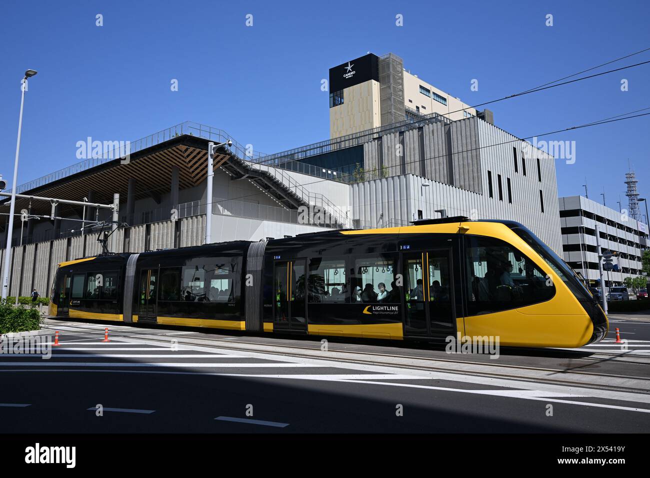 A light rail transit train passes through Utsunomiya in Tochigi ...