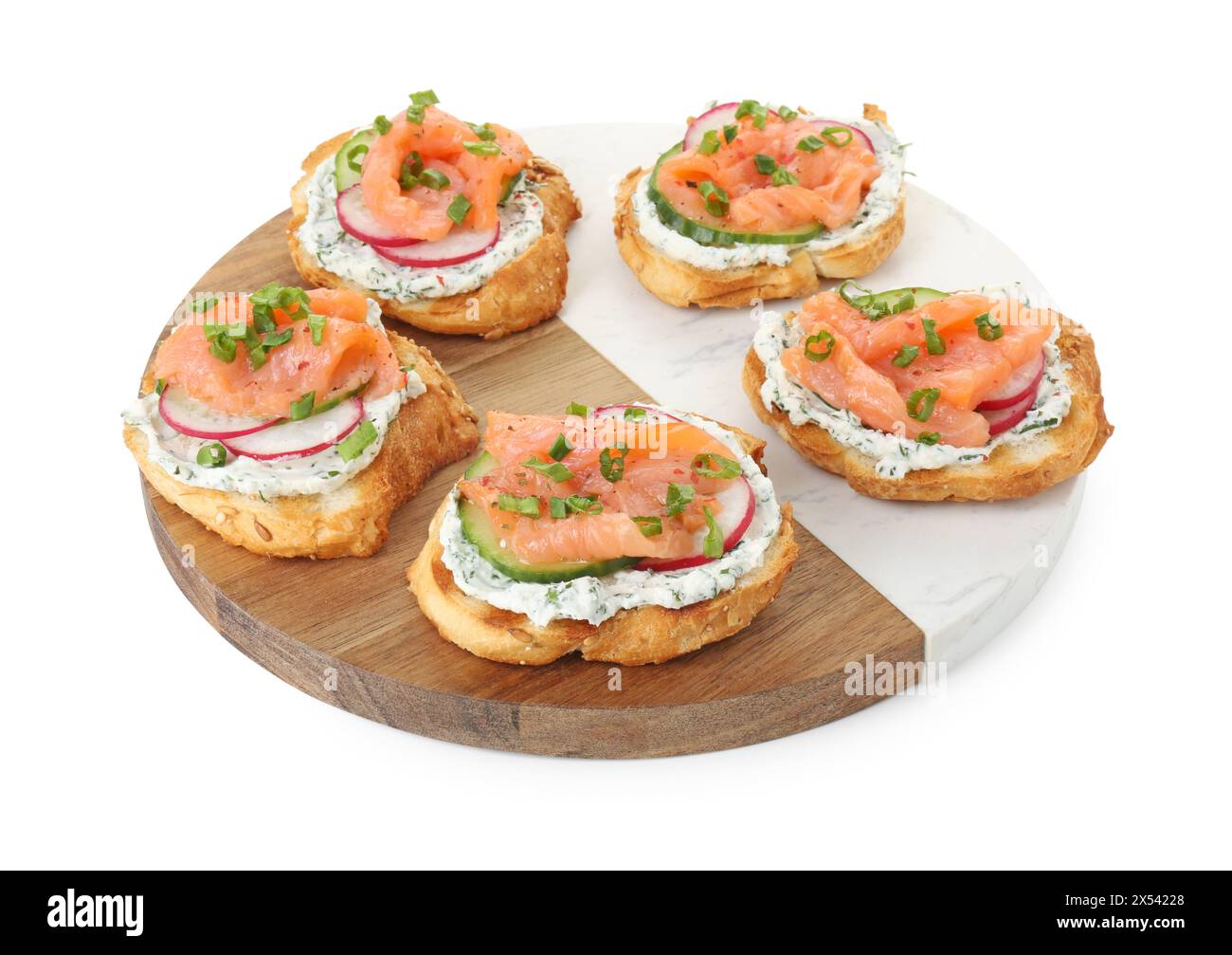 Tasty canapes with salmon, cucumber, radish and cream cheese isolated ...