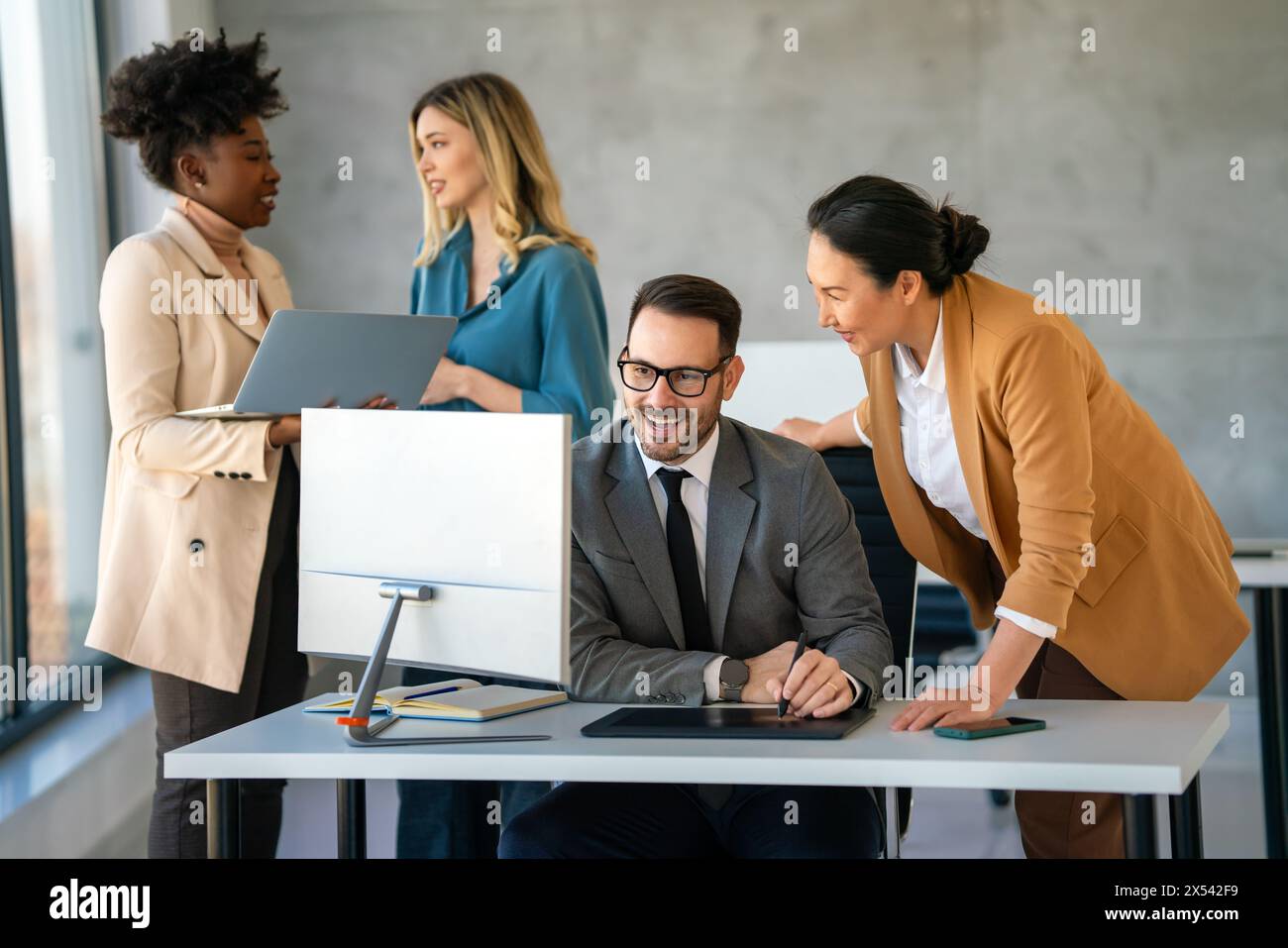 Multiethnic business people project team working together at meeting ...