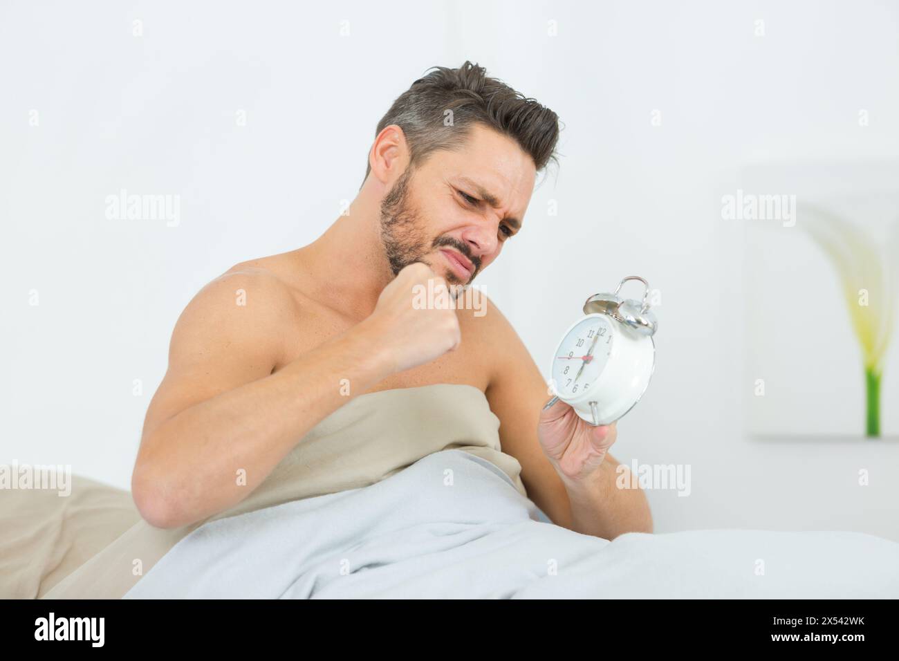 angry man waking up Stock Photo - Alamy