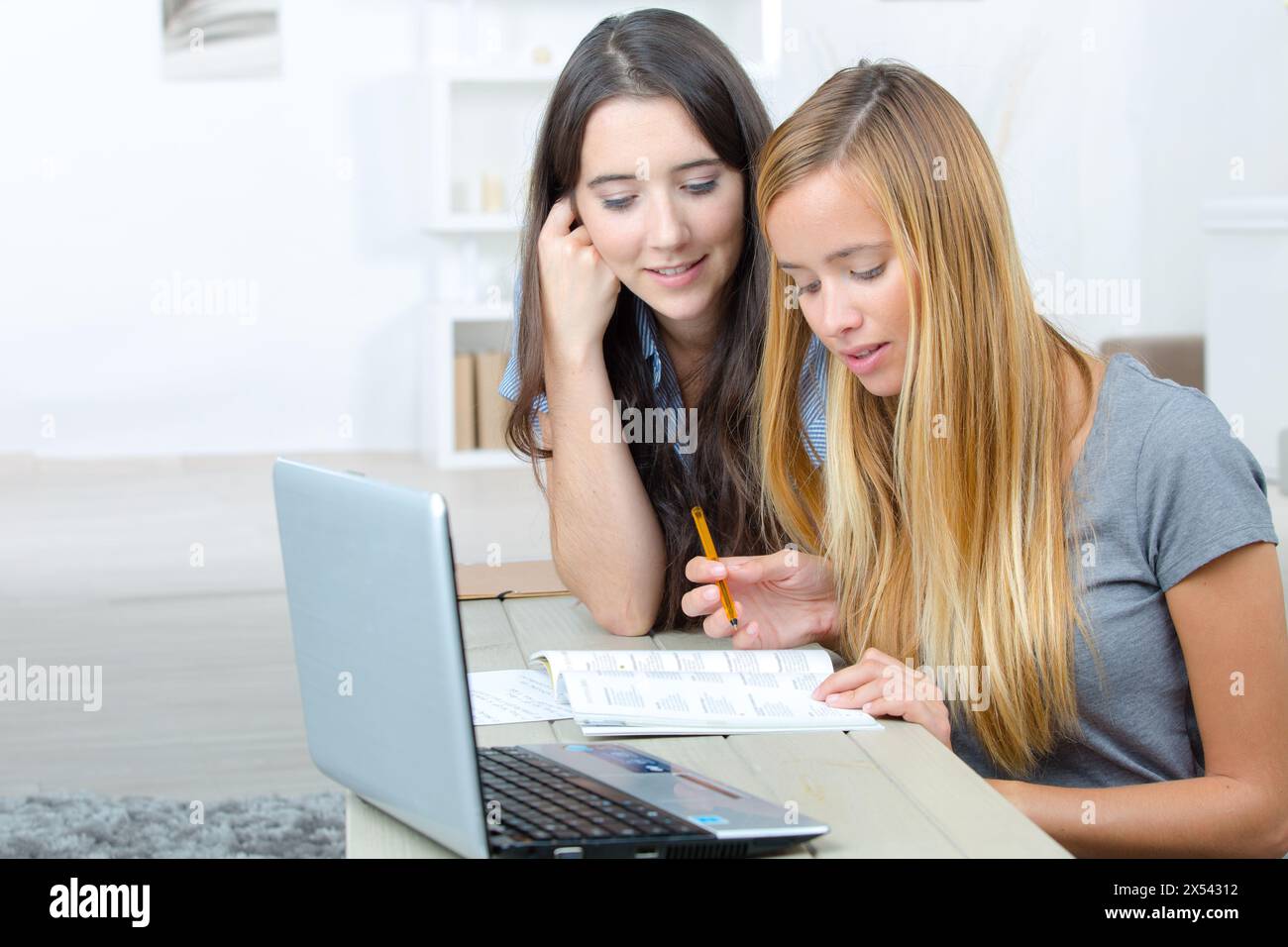 Young friends doing school hi-res stock photography and images - Alamy