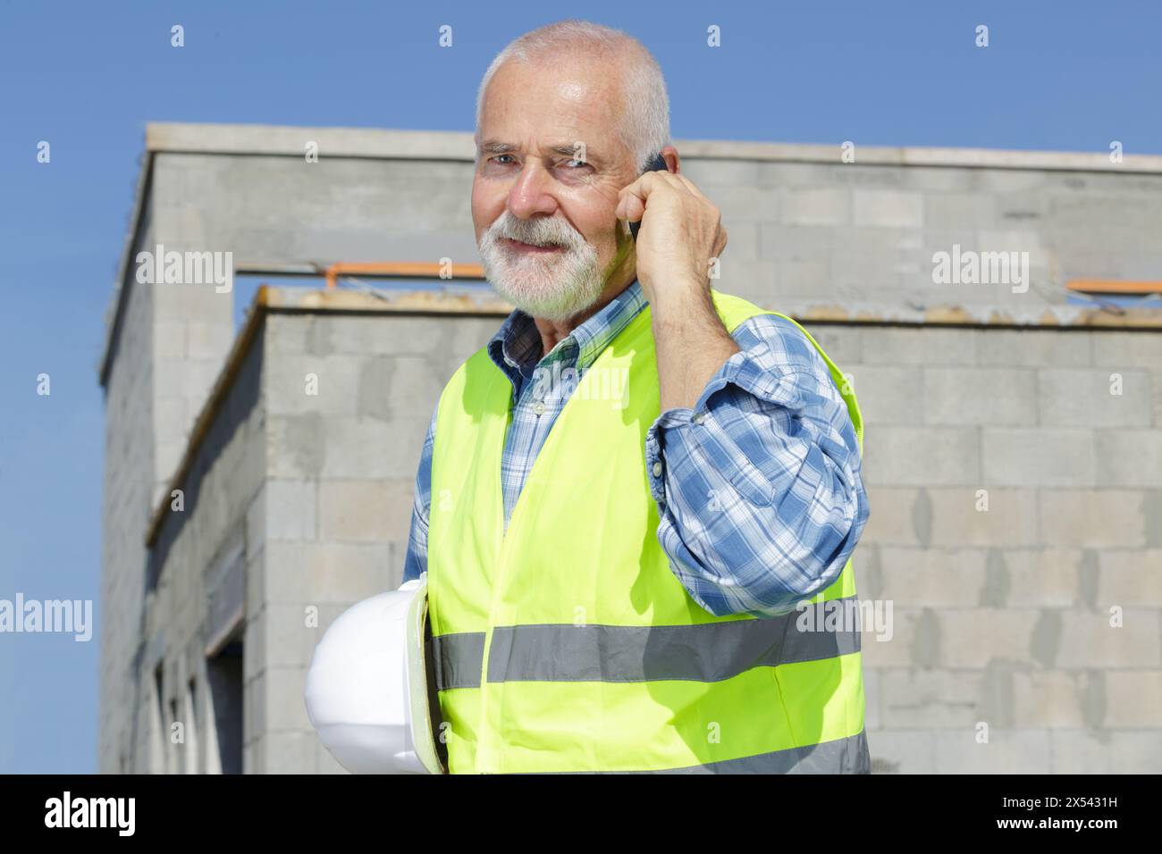 Entrepreneur on construction site using hi-res stock photography and ...