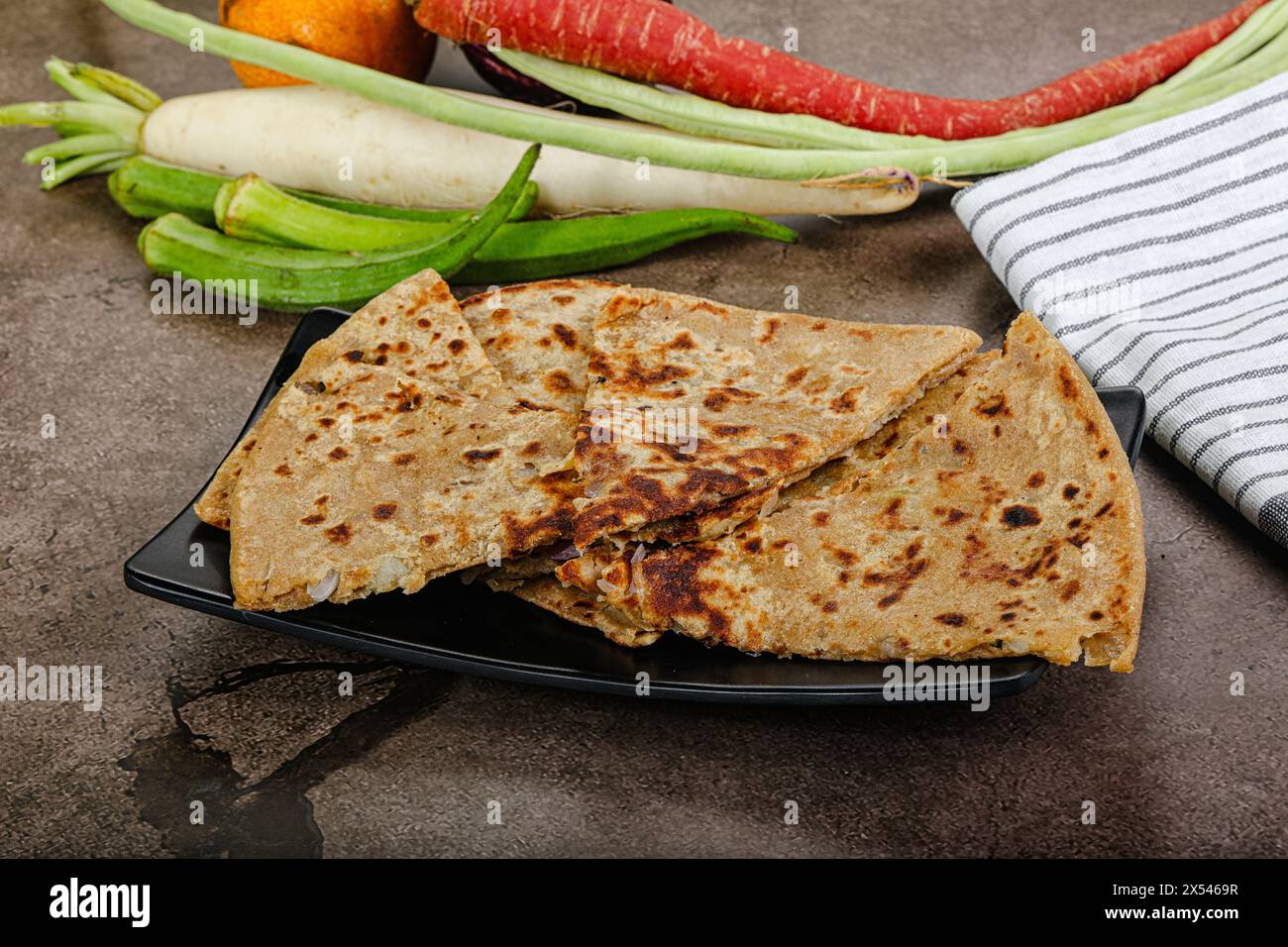 Indian vegetarian Aloo Paratha - bread with potato Stock Photo - Alamy