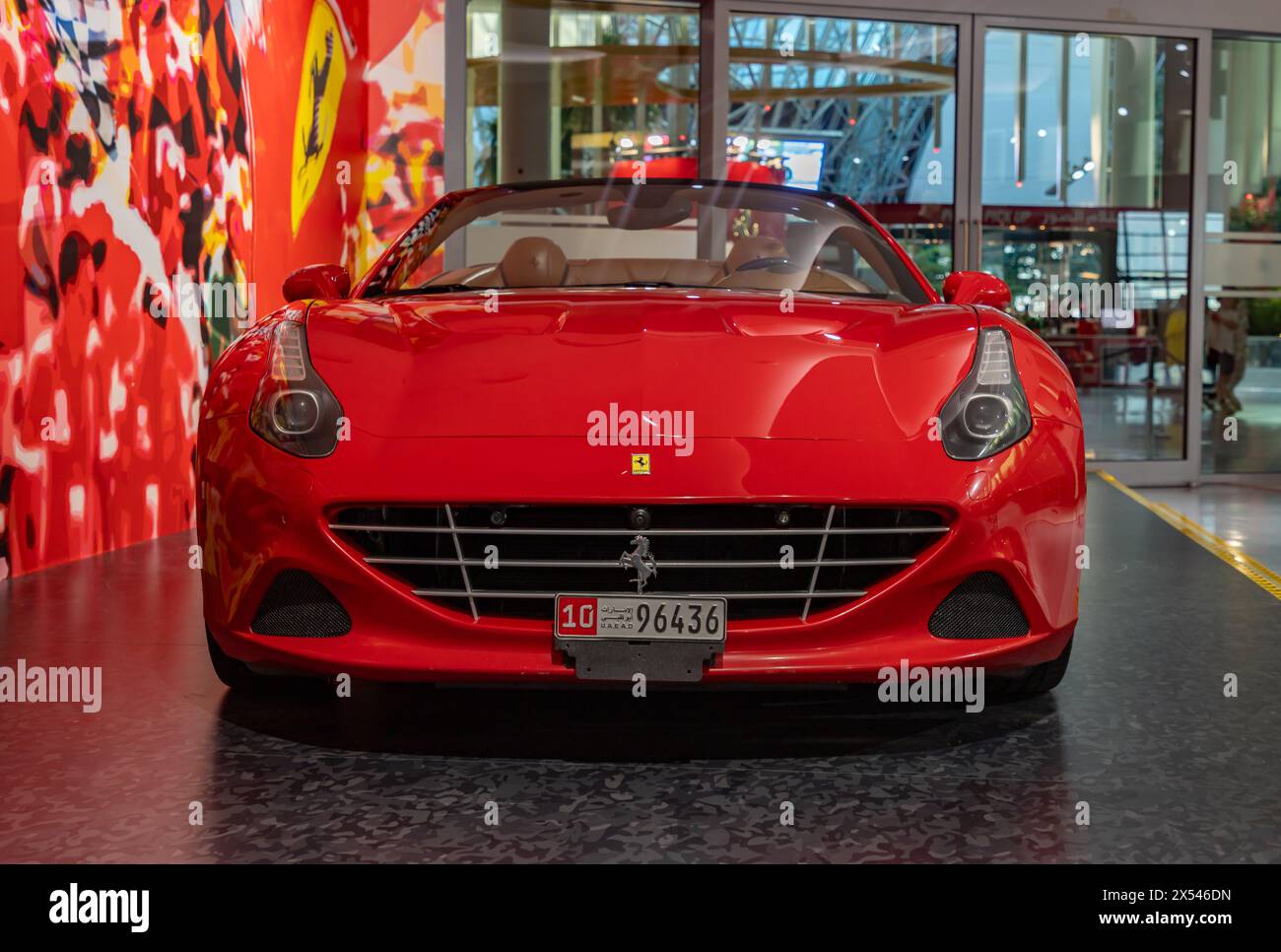 A picture of a red Ferrari California T at the gift shop of the Ferrari ...