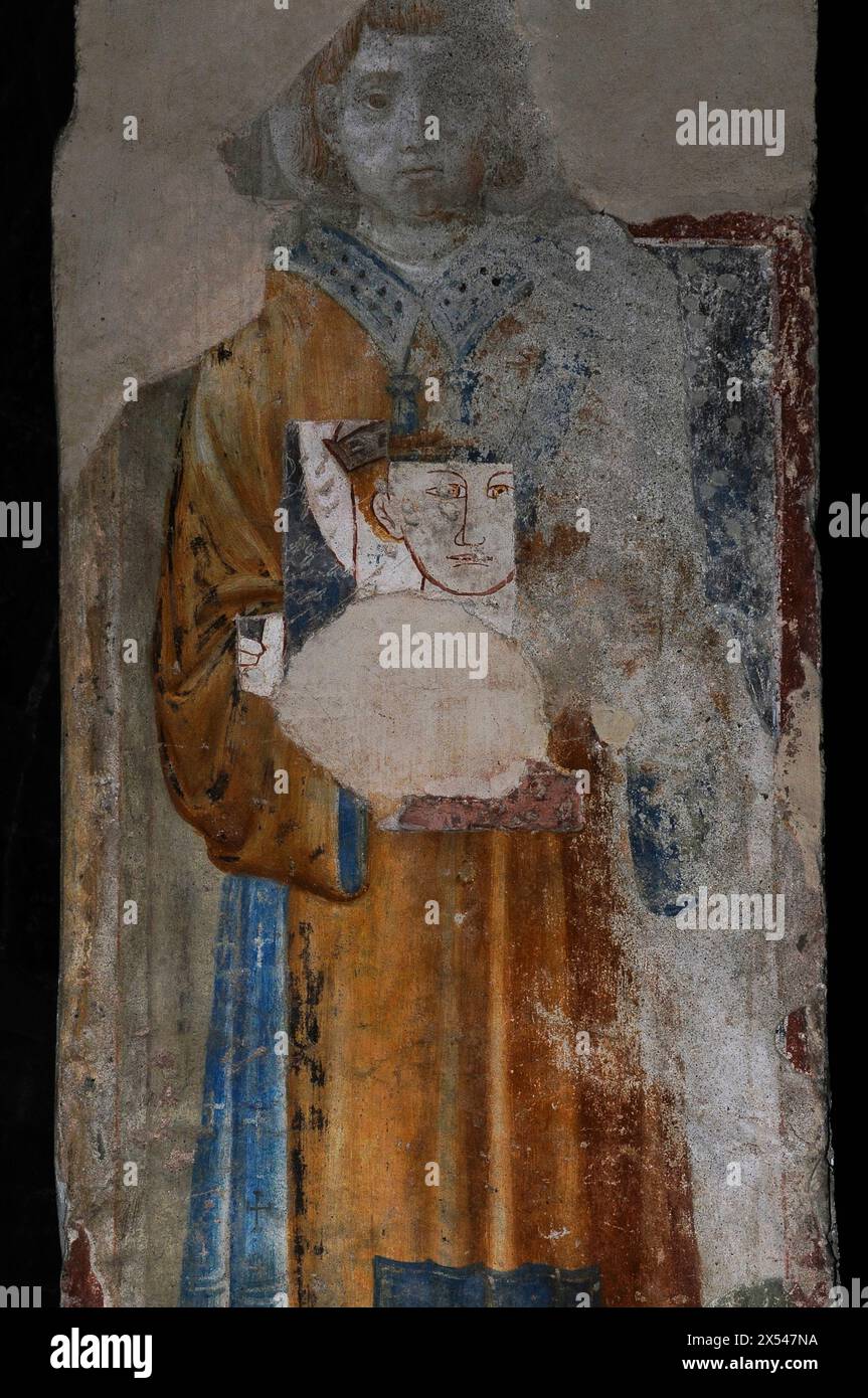 Fragmentary fresco depicting a saint, probably St Stephen, on face of ...