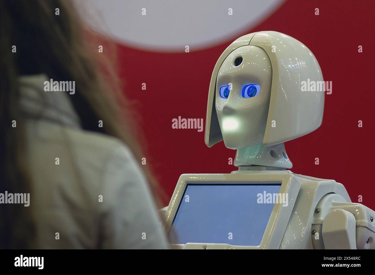 Girl communicates with the robot. Artificial intelligence Stock Photo ...