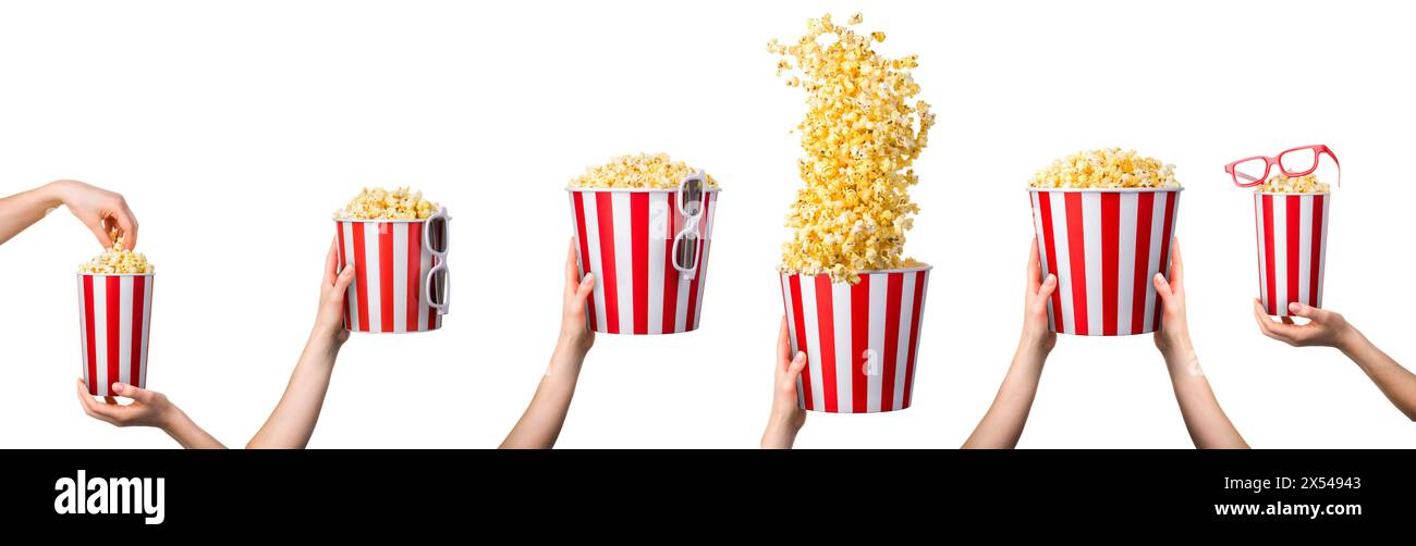 Woman hand taking popcorn from striped bucket isolated on white ...