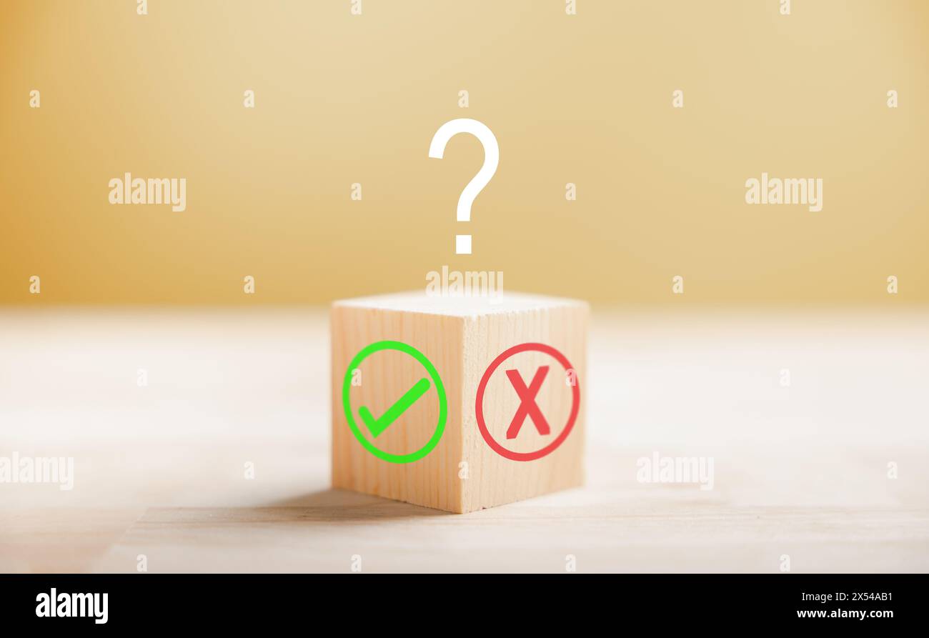 Green check mark and red x on wooden block signify decision making ...