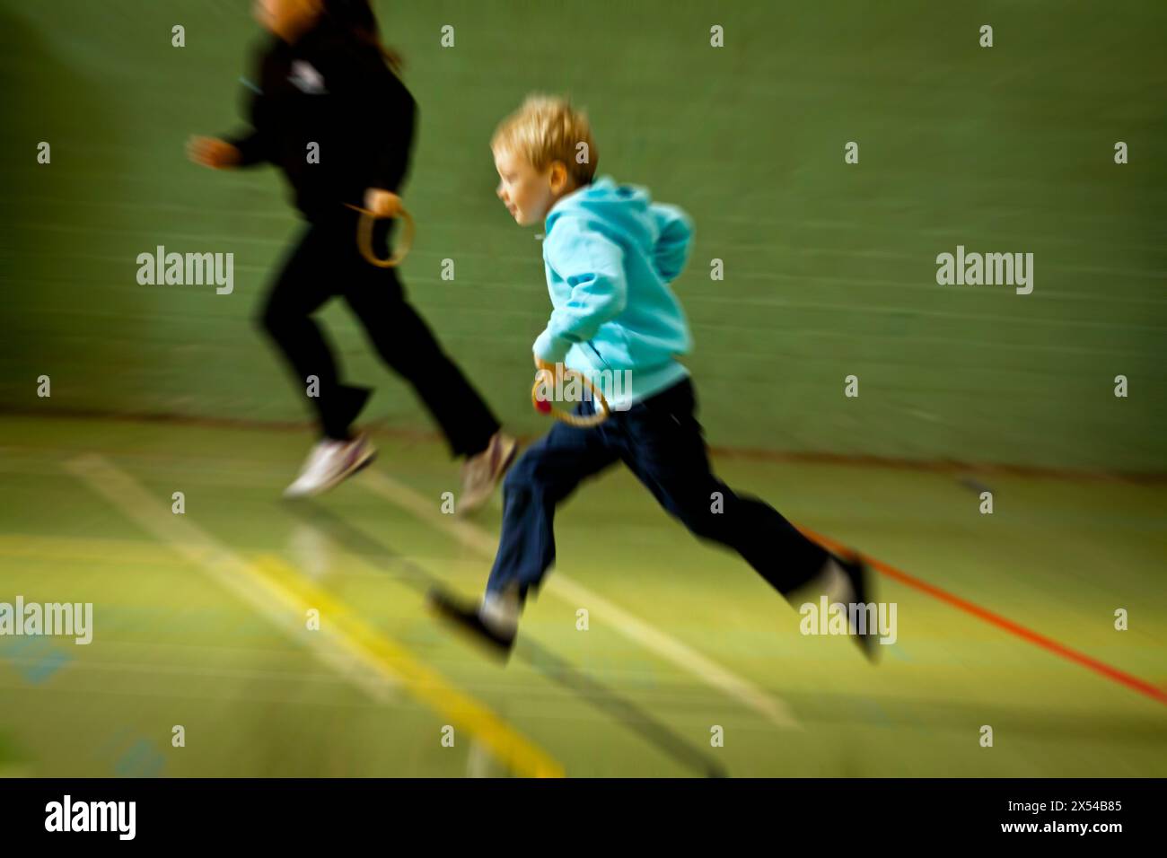 Children in school playground pe lesson hi-res stock photography and ...