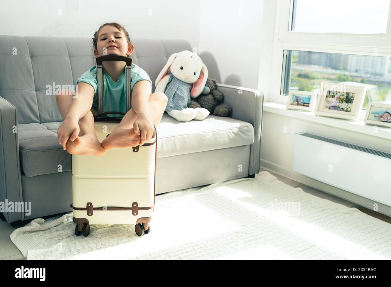 Little girl - traveler, smiling teenage girl - tourist sitting with ...