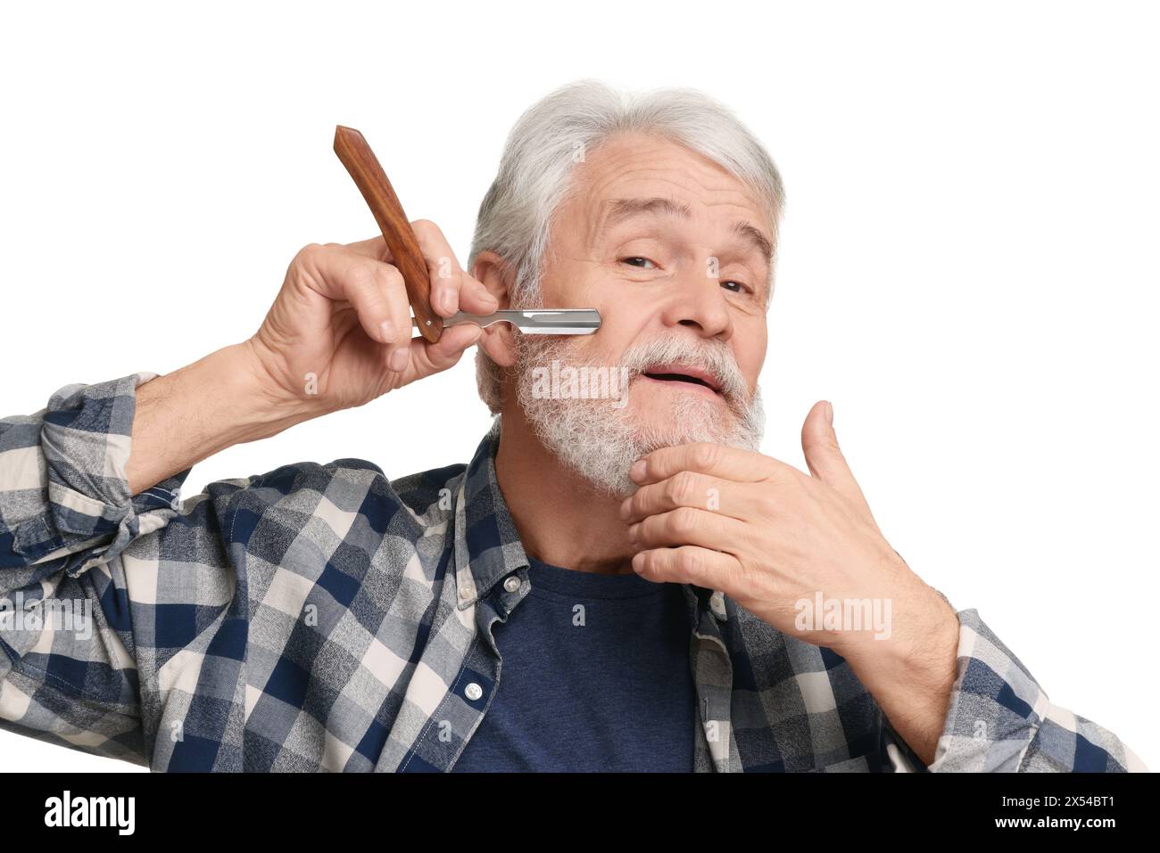 Senior man shaving beard with blade on white background Stock Photo - Alamy