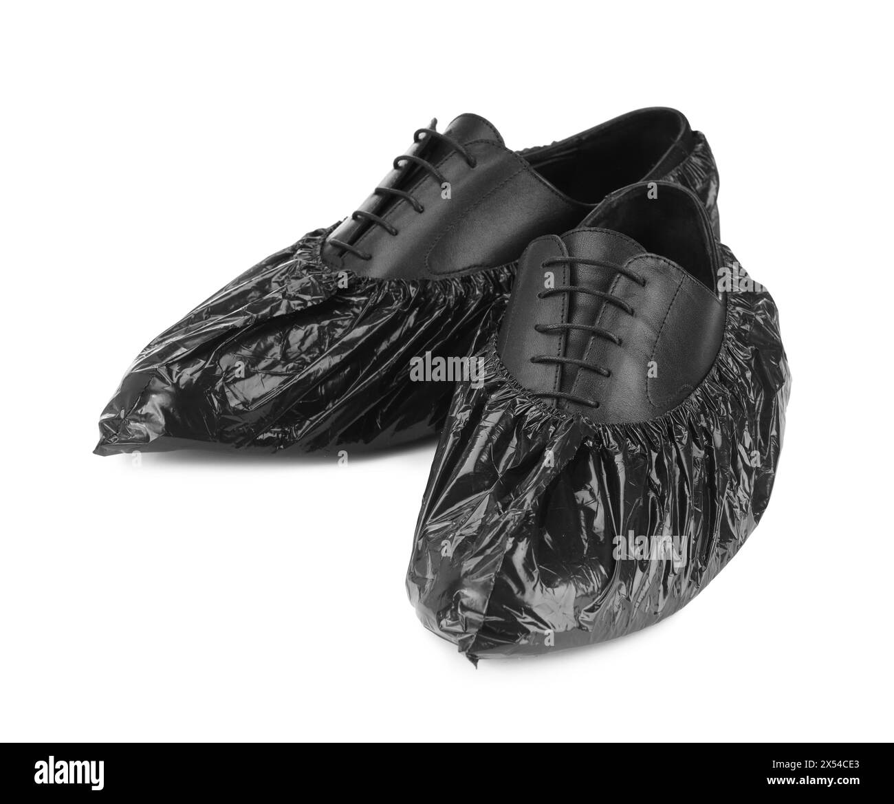 Men's shoes in black shoe covers isolated on white Stock Photo - Alamy