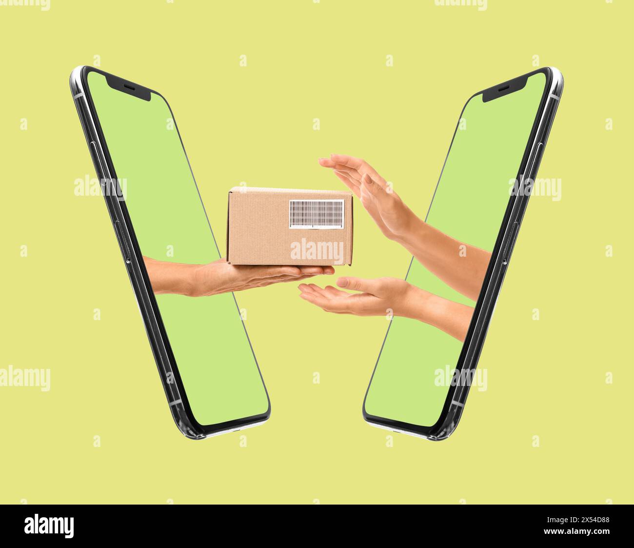 Mobile phones and hands with parcel on green background Stock Photo - Alamy
