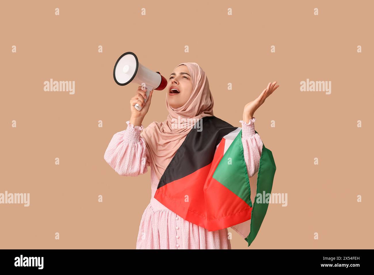 Young Muslim woman with Palestine flag and megaphone screaming on beige ...