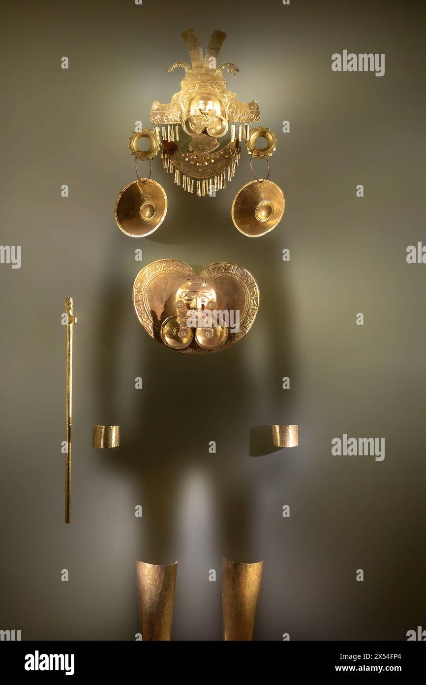Pre-Columbian gold statuette in the Museo del Oro. Golden indigenous ...