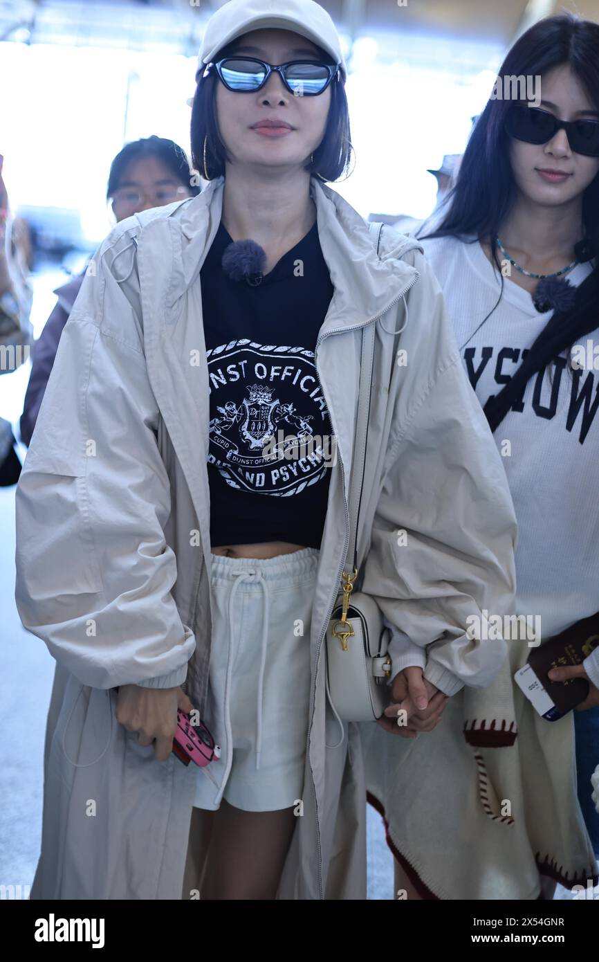 Chinese actress, model, and singer Qin Lan appears at the airport in ...