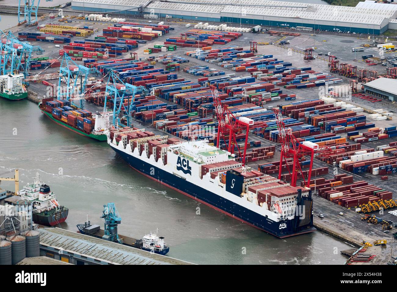 An aerial view of Liverpool Docks with a container ship loading ...