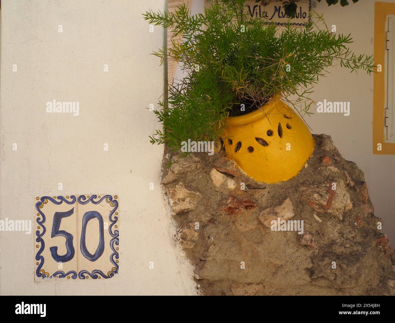 House number 50 in Portuguese ceramic tiles, with ceramic plant pot ...