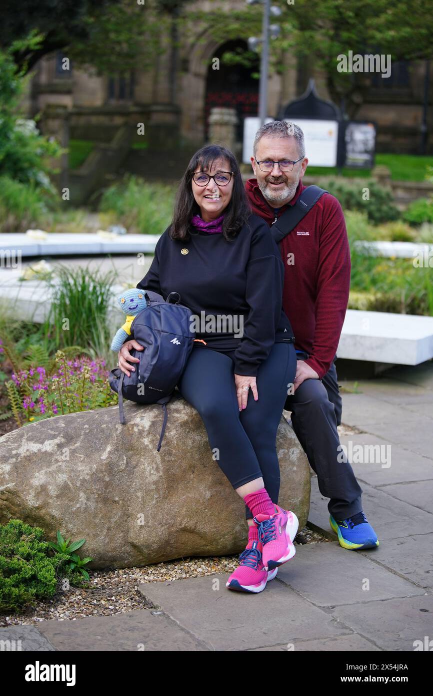 Figen Murray, the mother of victim Martyn Hett, with her husband Stuart at the memorial outside ...