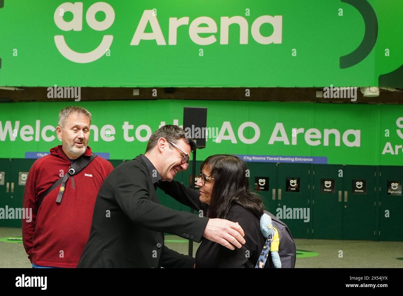 Greater Manchester mayor Andy Burnham hugs Figen Murray, the mother of ...