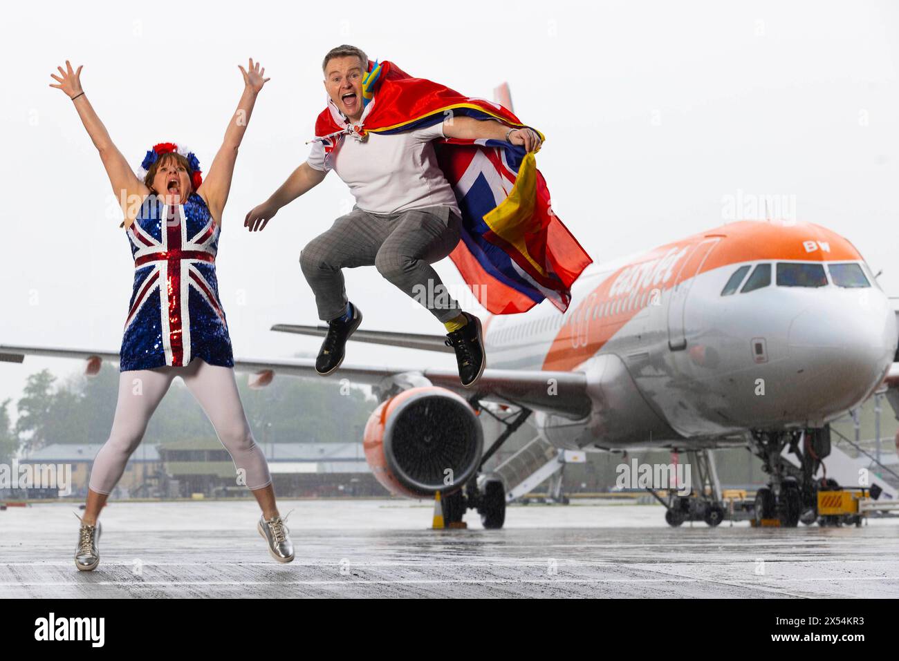 EDITORIAL USE ONLY Eurovision fans Julie Ward and Mark Bowerman prepare ...
