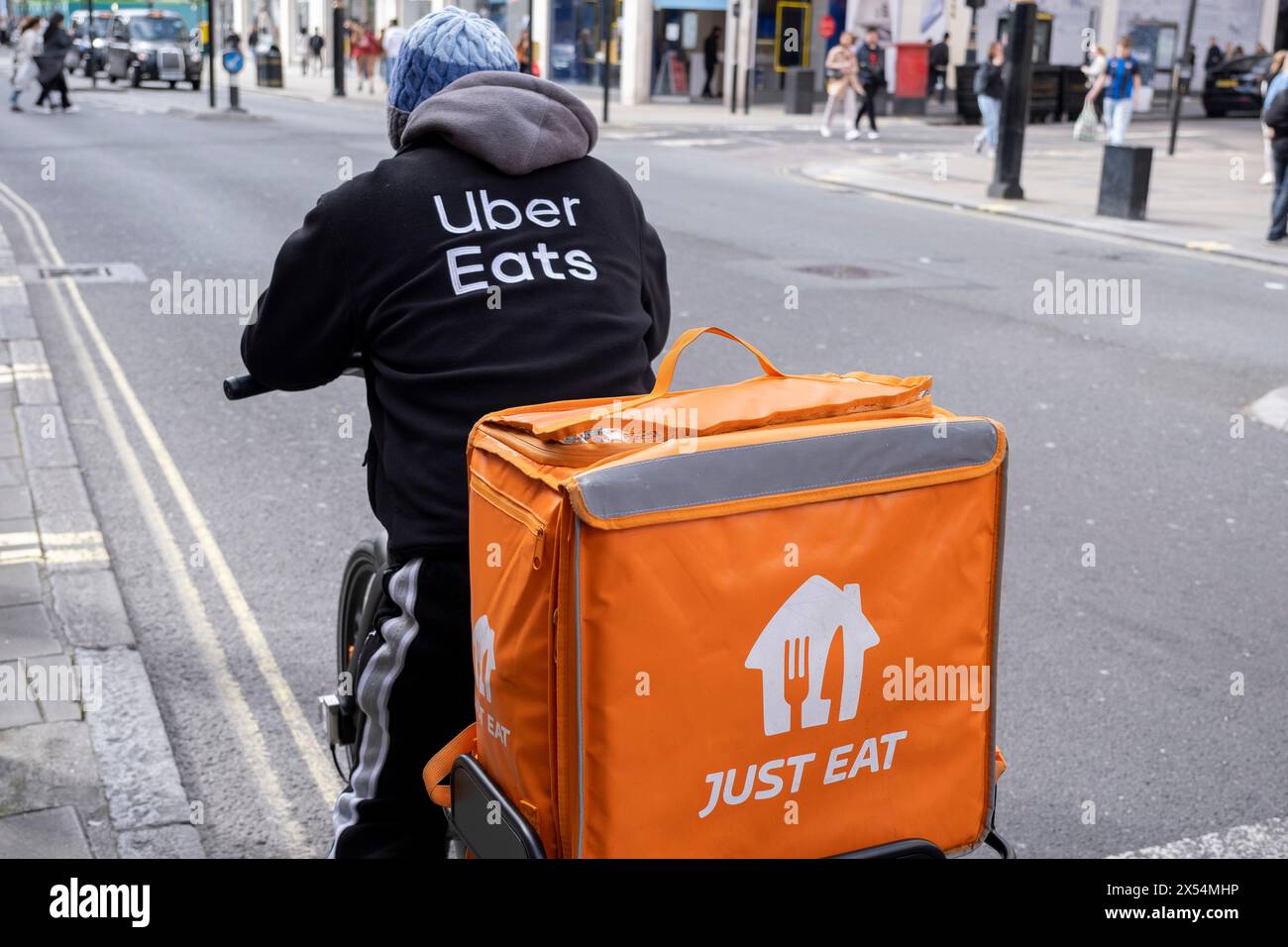 Just Eat / Uber Eats takeaway delivery cycle courier on 7th April 2024 in London, United Kingdom ...