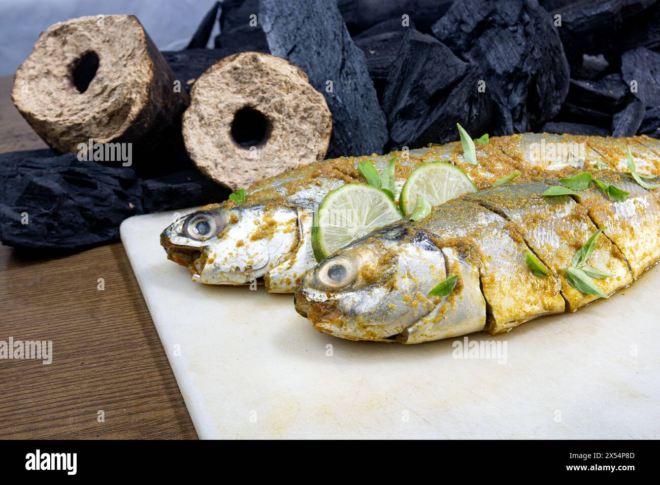 Fish BBQ. Marinated fish with salt pepper, green chili and turmeric ...