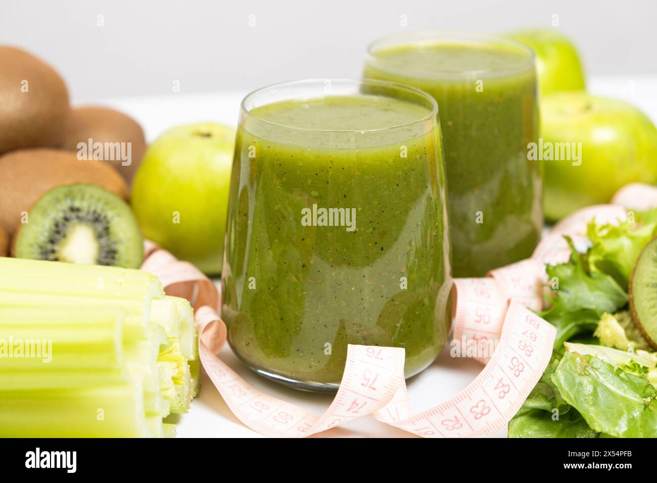 Green Low Calorie Slimming Smoothie, Measuring Tape Stock Photo - Alamy