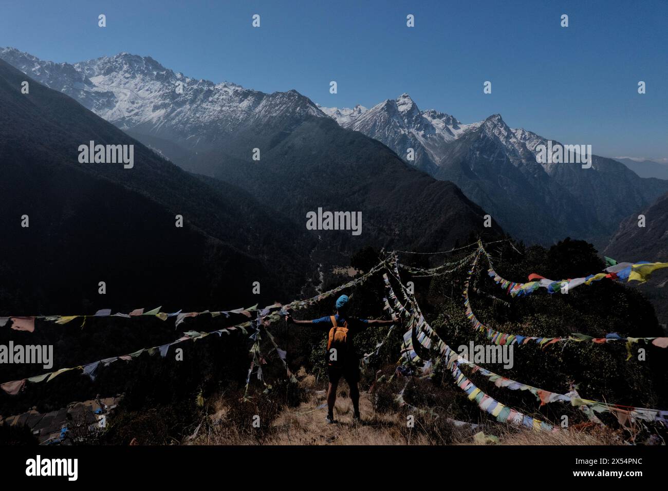 Prayer flags above the Tibetan village of Ghunsa on the Kangchenjunga ...