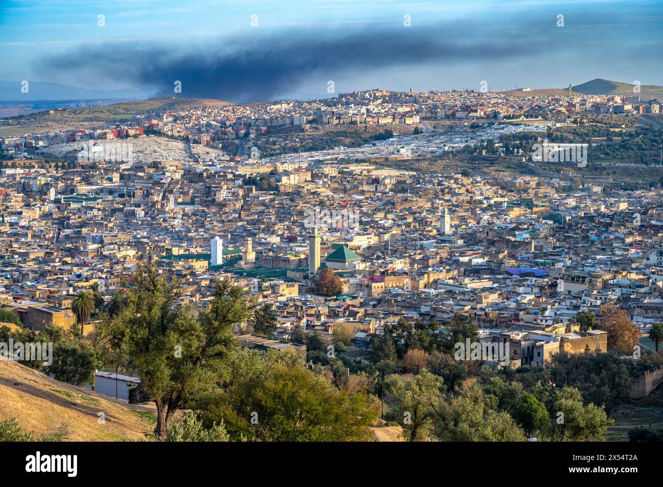 The sprawling Fez Medina under a clouded sky, as seen from the northern ...