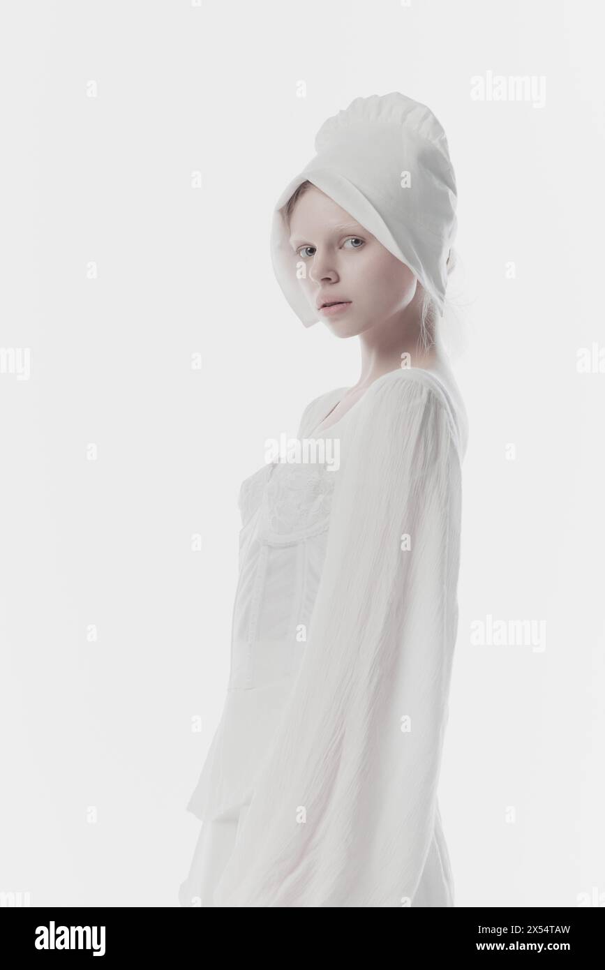 Portrait of beautiful, young girl dressed white vintage dress, as ...