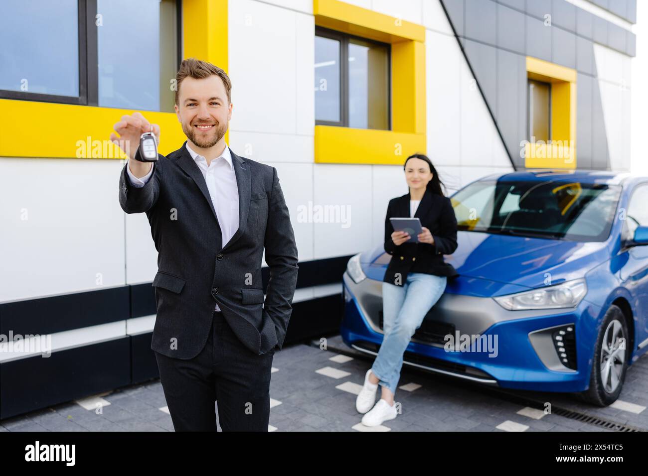 Male shop assistant clothes shop hi-res stock photography and images ...