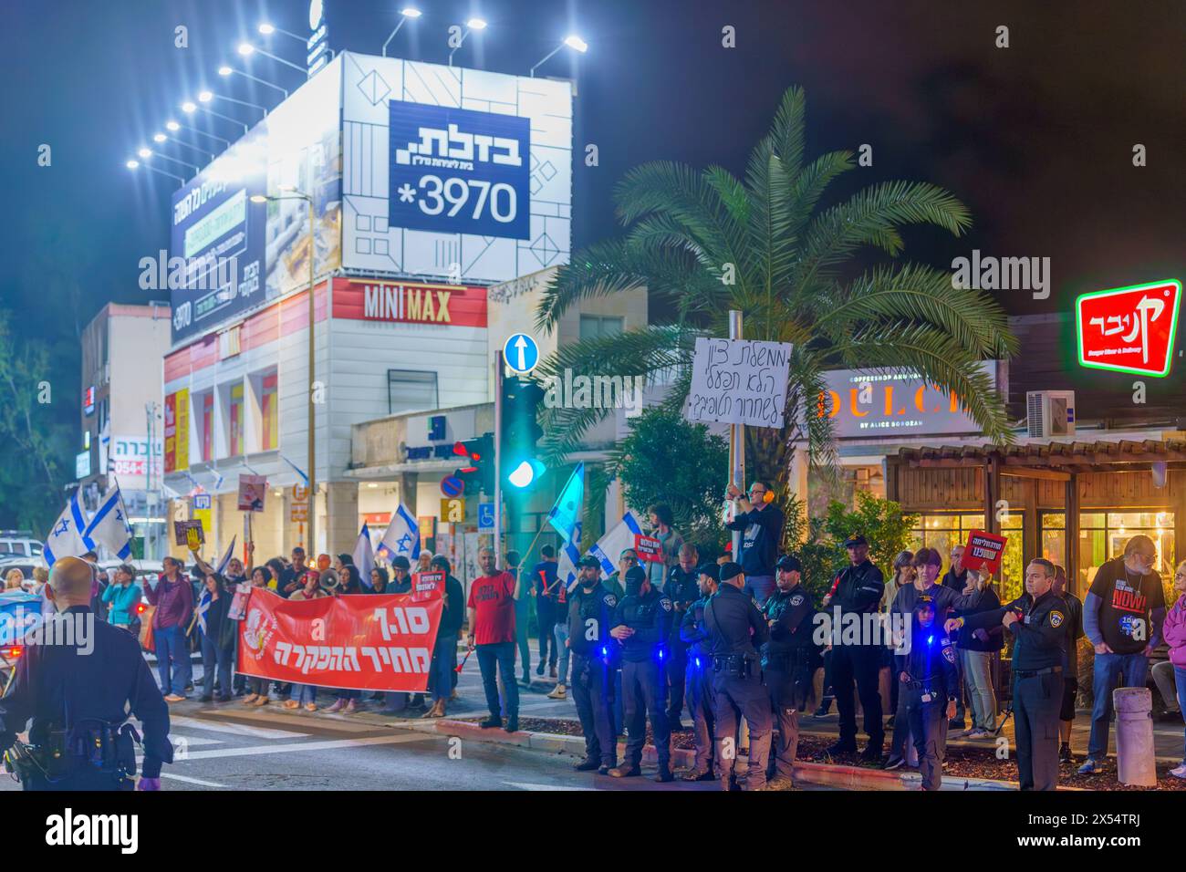 Haifa, Israel - May 06, 2024: People demonstrating, calling for a ...