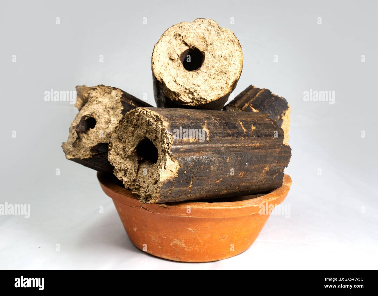 Charcoals, renewable solid fuel made from rice husk. cooking in a ...