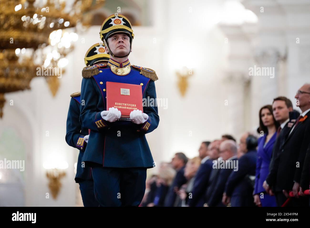 A Honour guard soldier carries the Russian Constitution during Vladimir ...